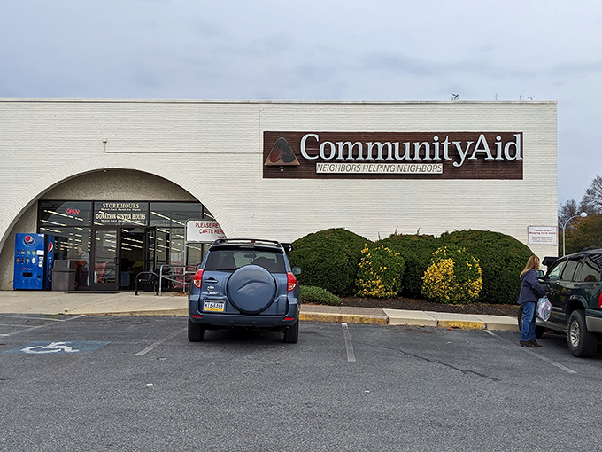 Community Aid's welcoming entrance promises organized aisles and friendly faces for every shopper's journey.
