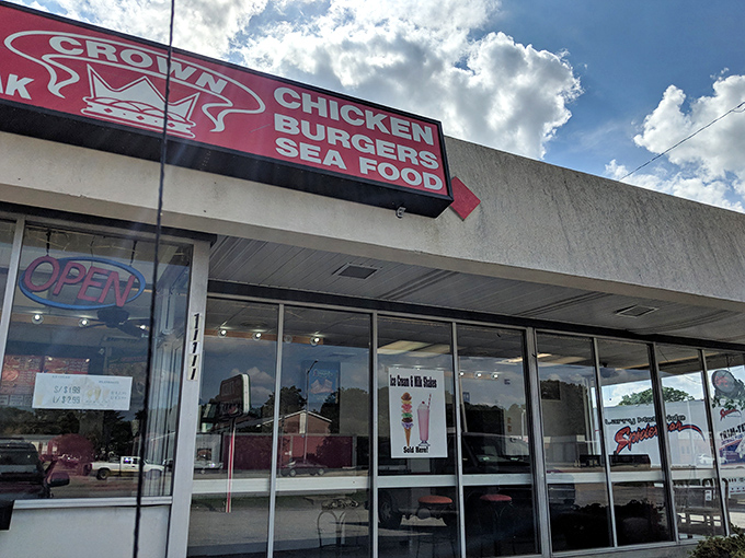 Crown Fried Chicken's no-nonsense storefront &ndash; where chicken royalty holds court without the fancy castle.