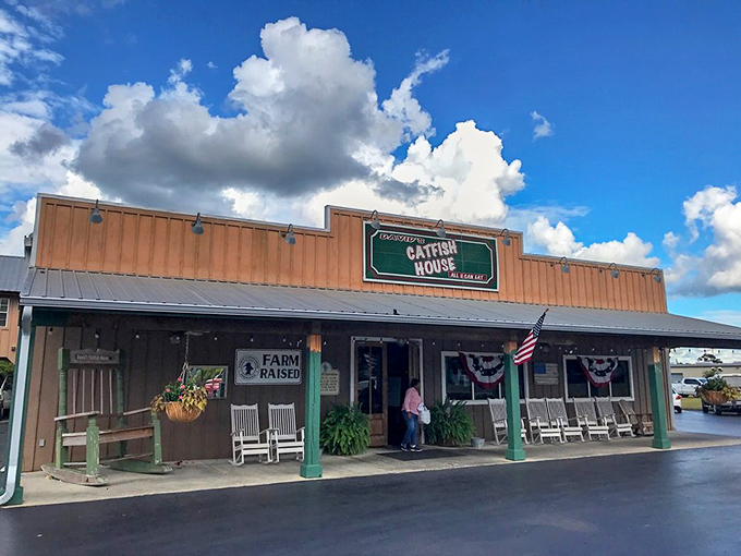 Farm-raised signs and American flags signal honest cooking where quality trumps fancy presentation every single time.