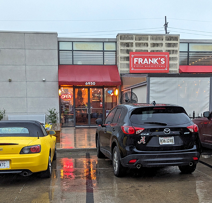 Frank's sleek exterior with those bold red awnings makes a statement: serious pizza happens here. Rain or shine, good pizza waits for no one.