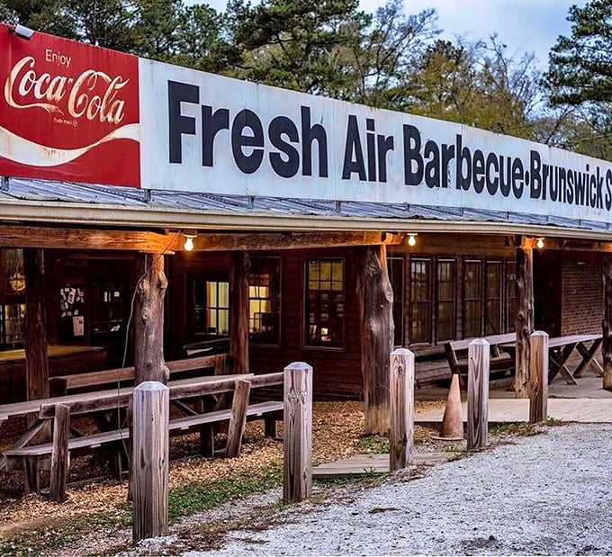 That classic Coca-Cola sign has been guiding hungry travelers to barbecue bliss longer than most of us have been alive.