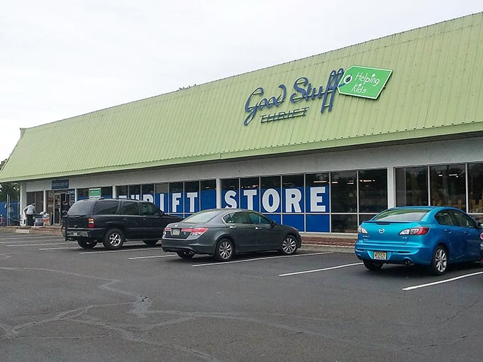 Good Stuff's distinctive green roof signals "eco-friendly" before you even step inside. That playful logo hints at the fun shopping experience waiting within.