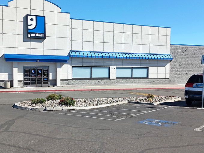 Goodwill's blue and gray facade welcomes shoppers to explore donated goods with endless possibilities.