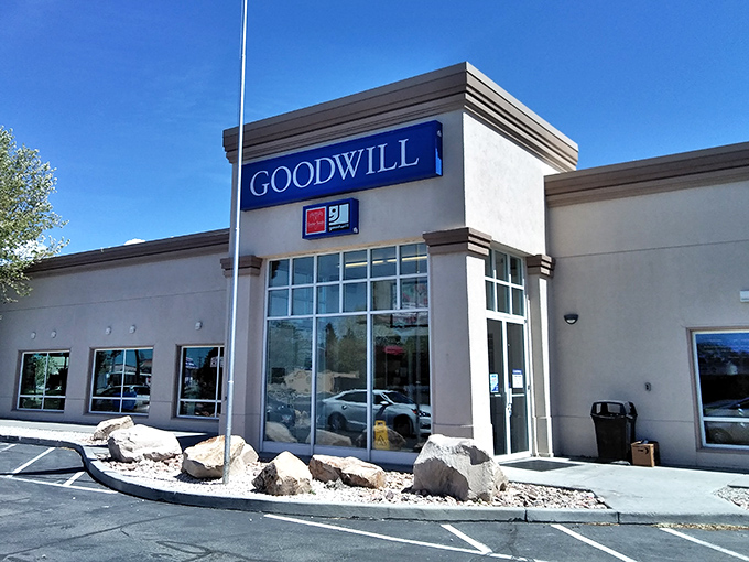 Goodwill's familiar blue sign stands tall – the thrift store equivalent of comfort food for dedicated bargain hunters.