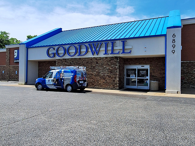 Memphis Goodwill's blue roof signals savings ahead, like a lighthouse for thrifty sailors.