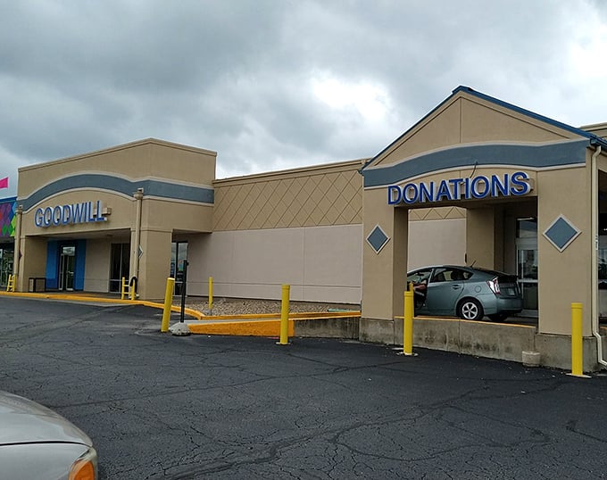 Goodwill's familiar blue sign: the North Star for budget-conscious shoppers navigating the sea of retail.