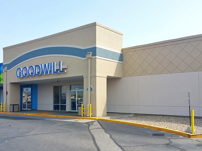 The familiar blue Goodwill sign stands as a beacon for smart shoppers who know quality doesn't require fancy prices.
