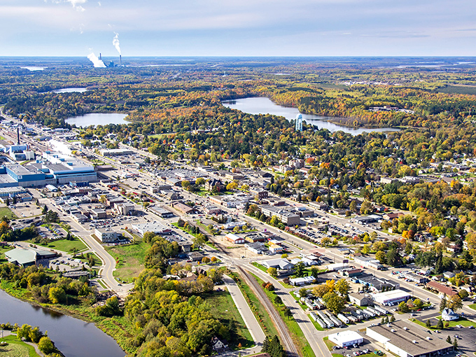 Bird's-eye views reveal a town perfectly nestled between lakes and forests, where natural beauty comes standard with residency.