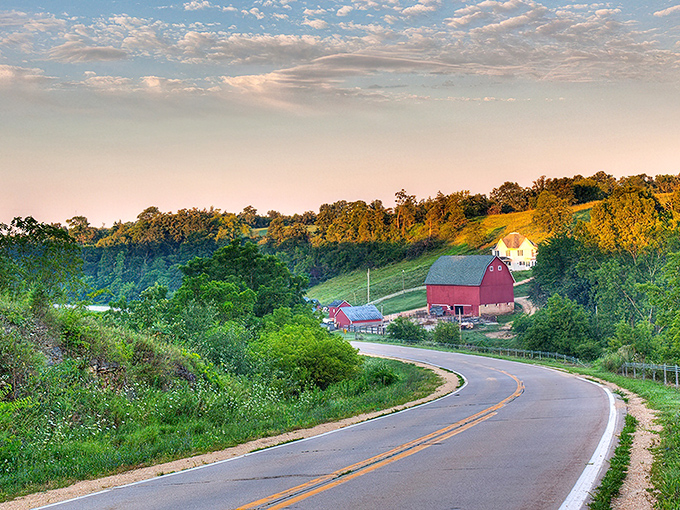 Grant Wood's inspiration comes to life with classic red barns nestled in rolling hills. American Gothic in 3D!