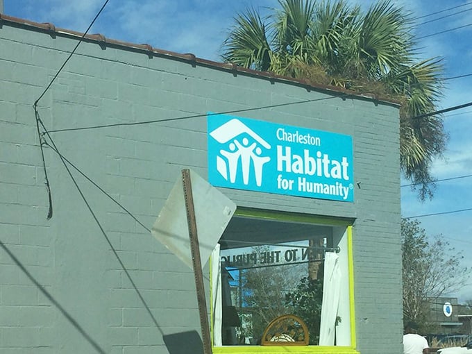 Habitat for Humanity's teal storefront stands out like a Caribbean oasis in Charleston. This building houses furniture dreams at yard sale prices!