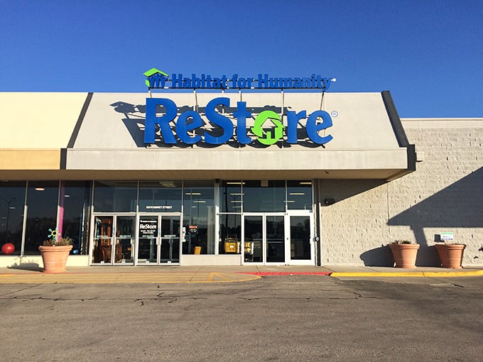 The ReStore's bright blue sign stands out against the clear Nebraska sky&mdash;a beacon for DIY enthusiasts and bargain hunters.