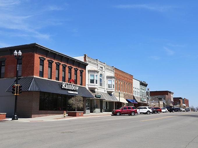 Rainbow Communications indeed! Hiawatha's sun-soaked streetscape delivers a spectrum of brick hues that would make Chip and Joanna Gaines swoon with delight.