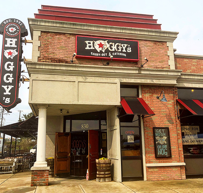 Hoggy's classic storefront design whispers "established excellence" to anyone seeking authentic Columbus BBQ. 