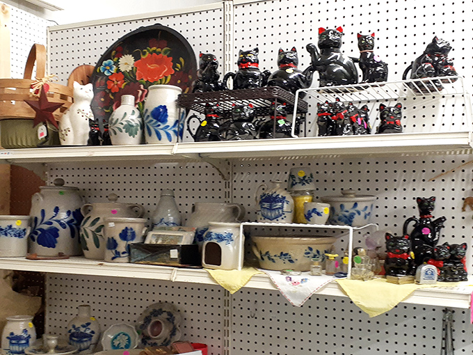 Shelves overflow with life's pottery and figurines, each item waiting patiently for its second chance at usefulness.