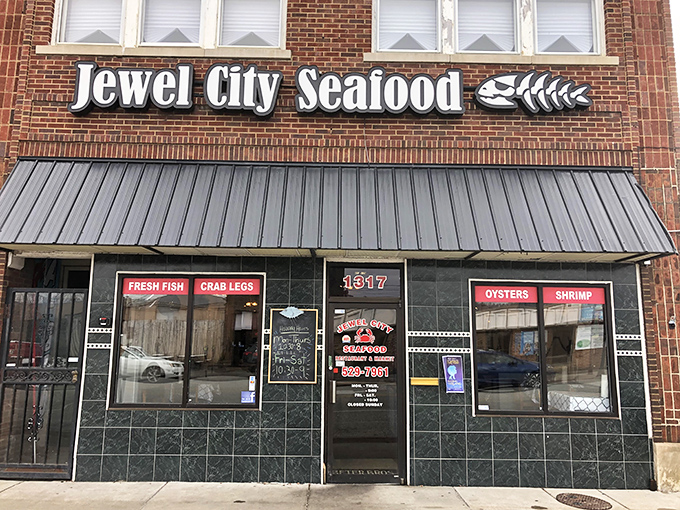 Classic brick and bold signage announce serious seafood business happening behind these welcoming downtown windows.