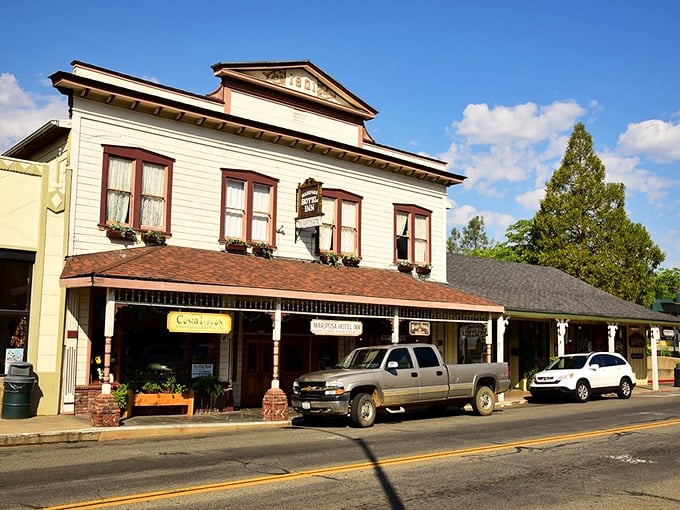 The Mariposa Hotel Inn stands like a wooden time capsule, offering glimpses of Gold Rush charm without requiring actual gold to retire here.