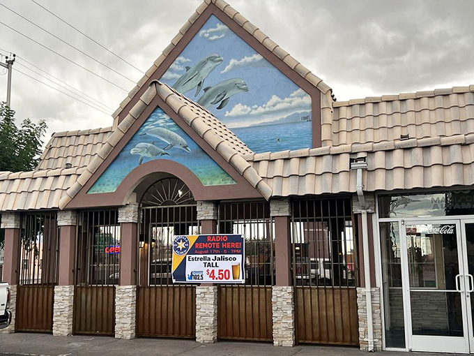 Mariscos Altamar's dolphin mural is like finding Atlantis in the desert. Those roof tiles have seen some serious seafood dreams!