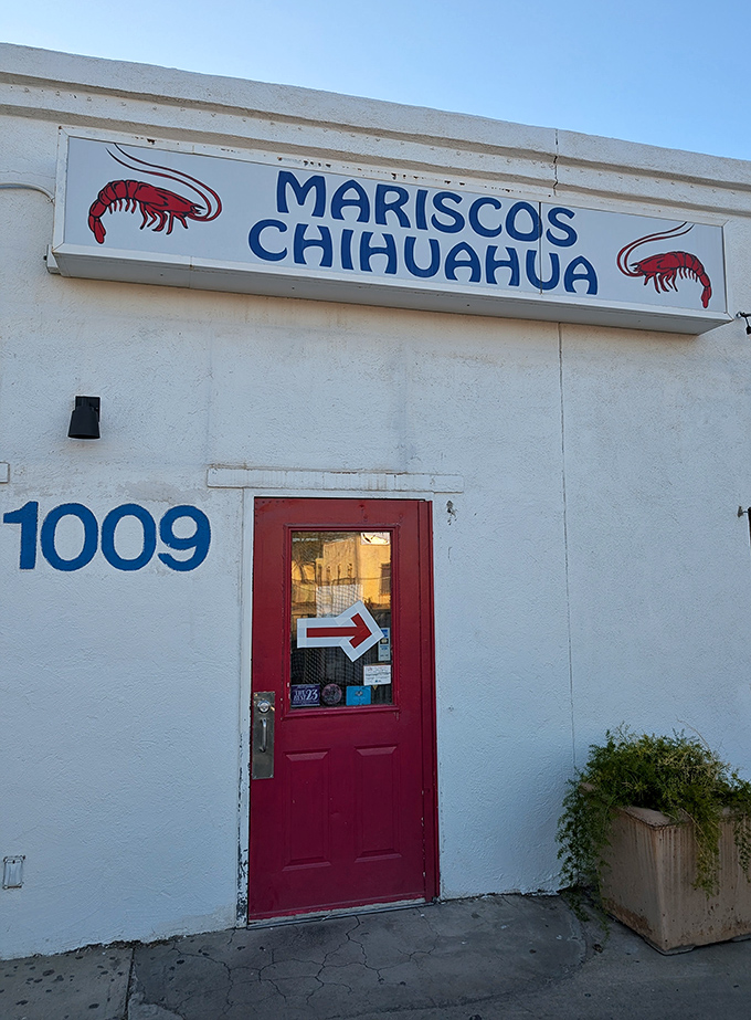 Mariscos Chihuahua's bright red door is like a portal to coastal Mexico, right in the heart of Tucson.