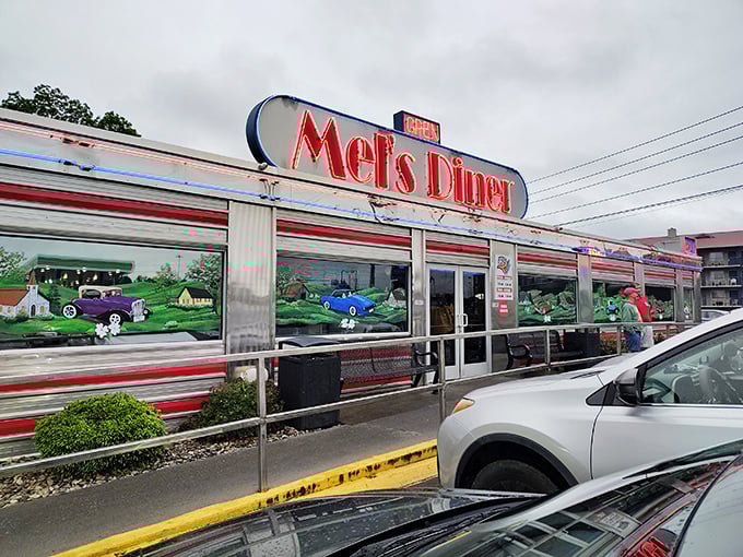 Mel's Classic Diner gleams in daylight with its authentic silver diner car exterior that looks like a postcard from the past.