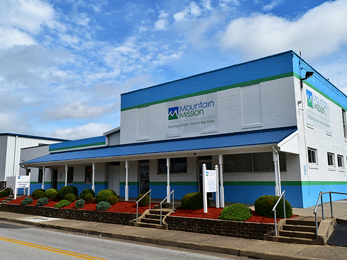 Mountain Mission's blue and white building stands ready to serve Charleston's thrifty shopping community. 