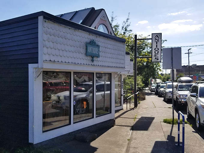 Classic white siding and a simple sign mark this Portland gem &ndash; like finding a secret clubhouse for vintage enthusiasts.
