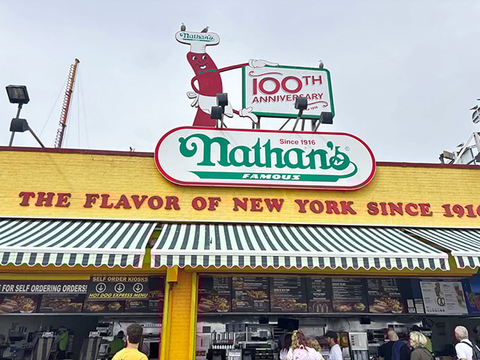 The yellow palace where hot dog dreams come true, complete with a century of satisfied customers.