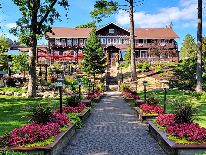 Garden pathways lead to lakeside bliss where every step feels like walking through a living magazine.