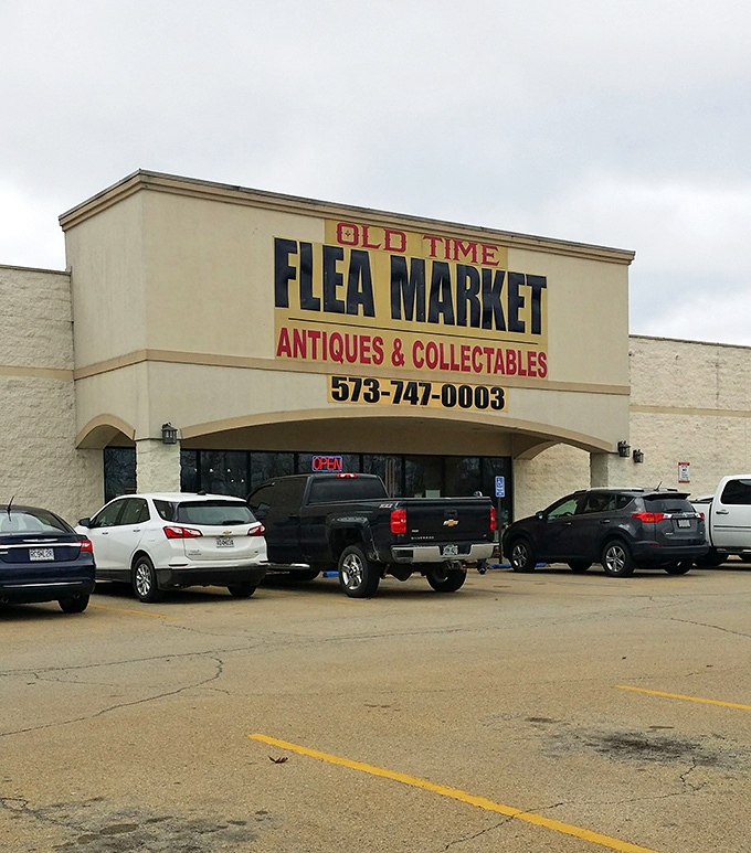 Old Time Flea Market's humble exterior hides decades of collected memories waiting for rediscovery.