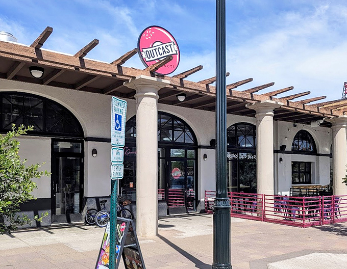 Outcast Doughnuts brings architectural charm to Mesa's sweet scene. Those arched windows frame a world of creative confections inside.