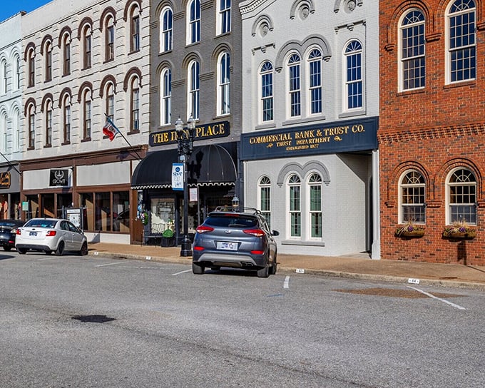 Paris's downtown square radiates small-town charm with its historic storefronts welcoming visitors daily. 
