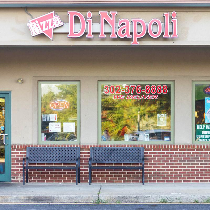 That pink and white sign isn't just decoration &ndash; it's a beacon calling pizza lovers home.