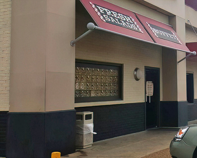 Pizza Inn's familiar red awnings welcome families seeking comfort food that never goes out of style.