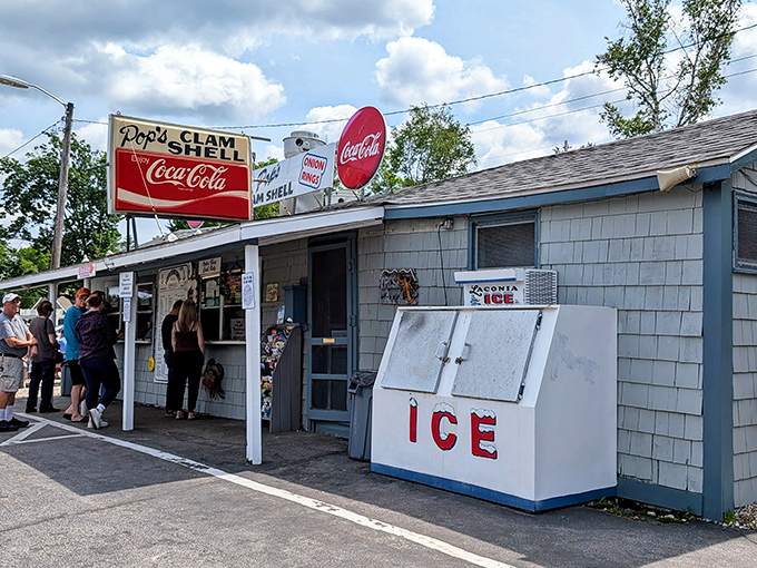 Vintage Coca-Cola signs and weathered wood create the perfect backdrop for timeless American comfort food.