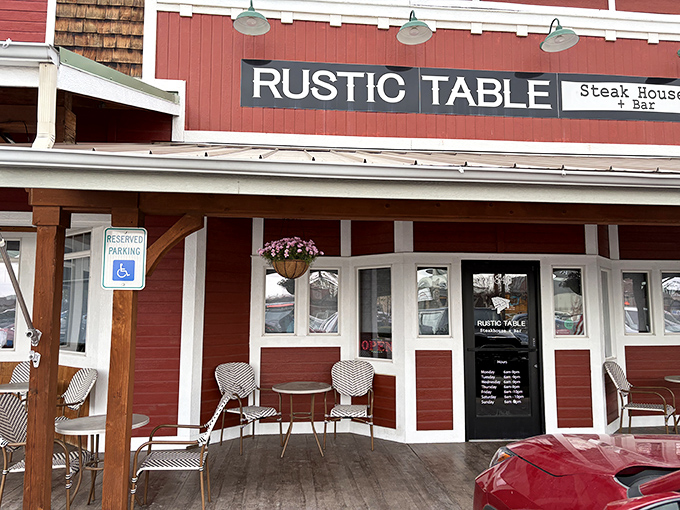The Rustic Table's charming red exterior and porch seating invite you to sit a spell and savor something special.