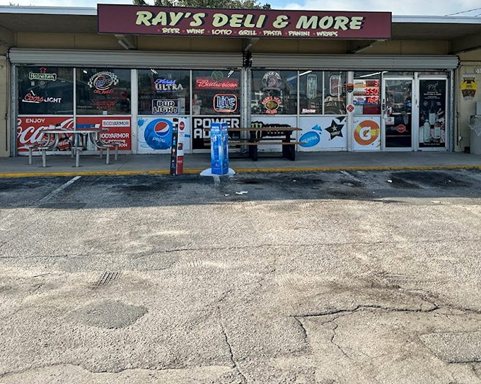Ray's old-school storefront covered in signs tells the story of decades serving Orlando.