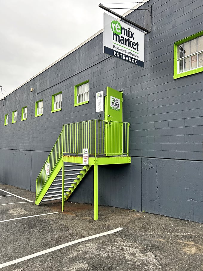 Industrial chic meets thrift store magic in this modern warehouse space where lime green accents promise seriously cool vintage discoveries.