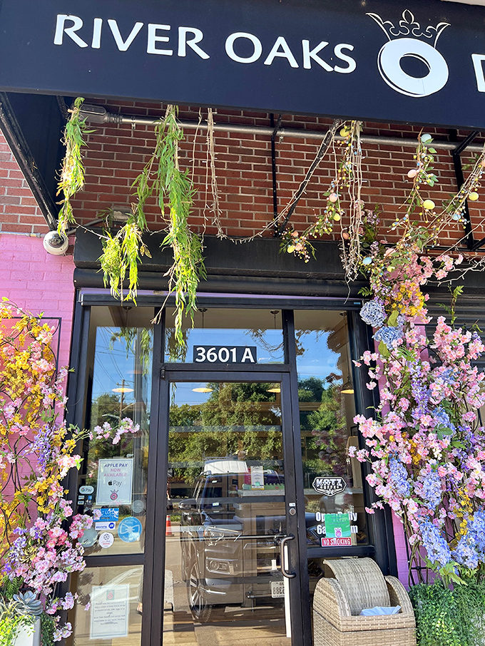River Oaks Donuts dresses up like a boutique but serves comfort by the dozen. Those hanging flowers aren't just decoration&mdash;they're setting the stage for your sugar rush.