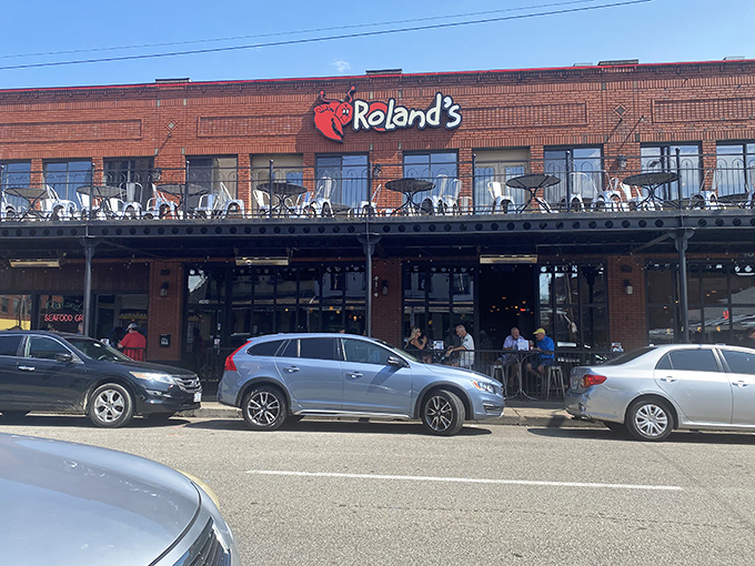Roland's brick facade and bustling outdoor seating area practically scream "join the seafood party!"