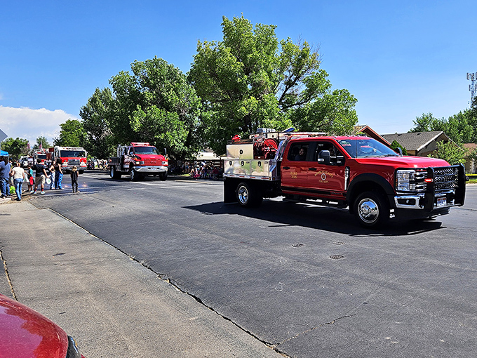 Fire trucks parade through streets where emergency expenses won't drain your carefully planned retirement savings.