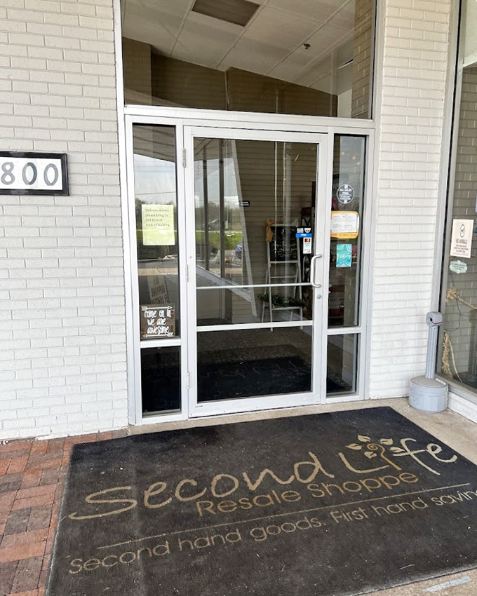 Second Life's understated entrance and charming welcome mat invite you into a world where pre-loved items find new homes.