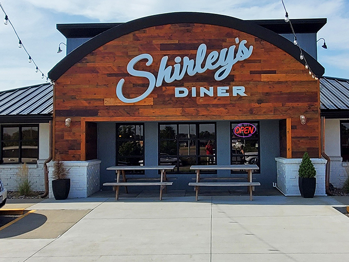 Shirley's rustic wooden facade feels like walking into a cabin where comfort food is always on the menu.