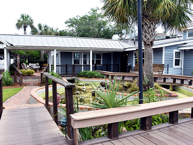 Brick walkways winding past tropical ponds and palm trees &ndash; this coastal spot feels like a mini-vacation before you even eat.