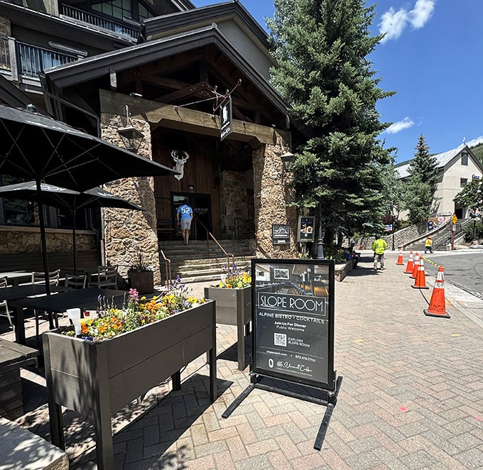 The Slope Room's mountain-modern entrance says "Yes, you can have luxury after a day on the slopes." Your tired legs deserve this.