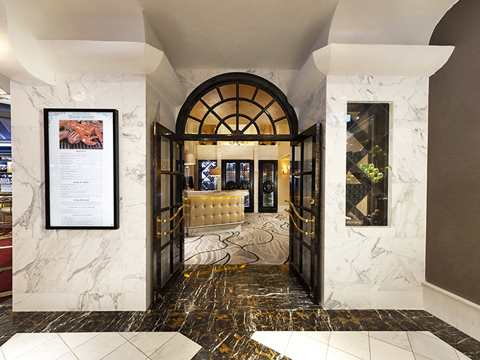 The Rainbow's elegant marble entrance sets the stage for what might be Nevada's most underrated steakhouse experience.