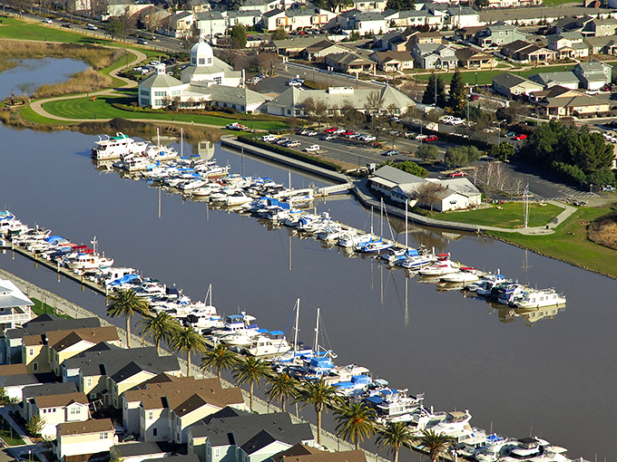 Suisun City's marina sparkles like a hidden jewel where boats bob peacefully and housing costs stay refreshingly reasonable.