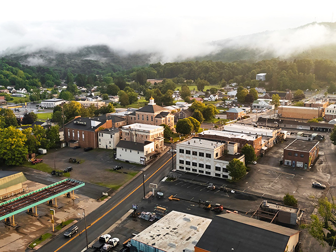 Morning mist plays hide-and-seek with Summersville's golden-domed centerpiece, nestled in a valley that whispers "good morning" to early risers.