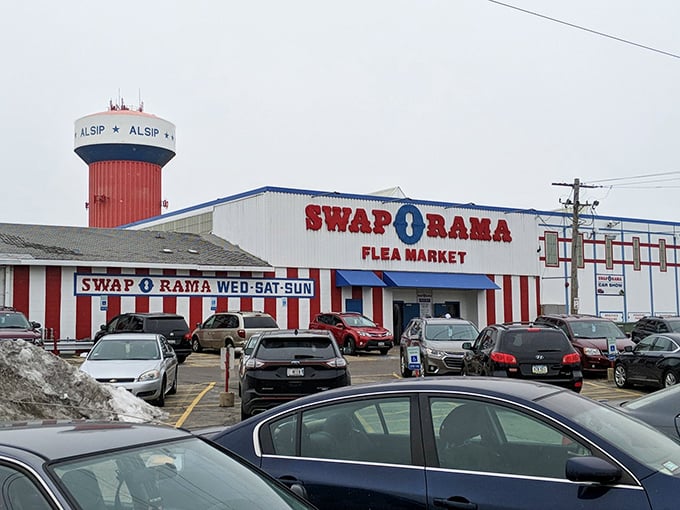 The red-and-white striped Swap-O-Rama stands proudly against Alsip's skyline, a patriotic beacon for bargain hunters across Chicagoland.