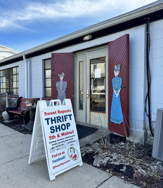 Sweet Repeats exterior: "Vintage charm with a modern mission. Those painted ladies on the door are practically inviting you inside!"