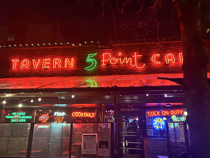 The 5 Point's neon glow has been a late-night beacon for hungry Seattleites seeking comfort food with a side of character.