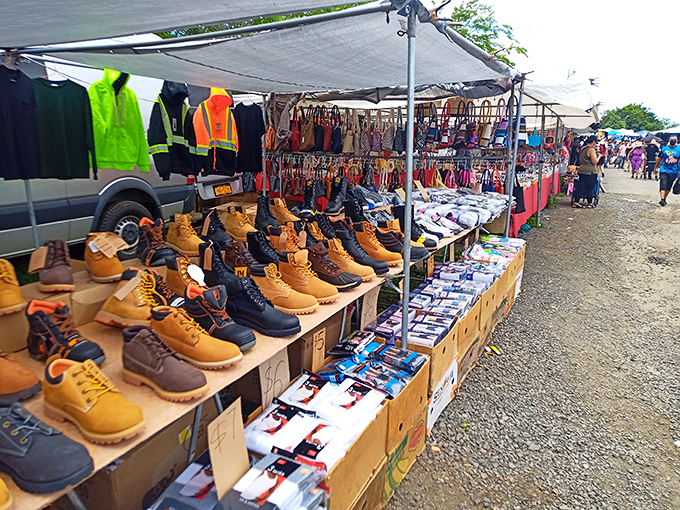 Work boots lined up like soldiers await their next mission—these aren't mall prices, and your feet will thank you later.